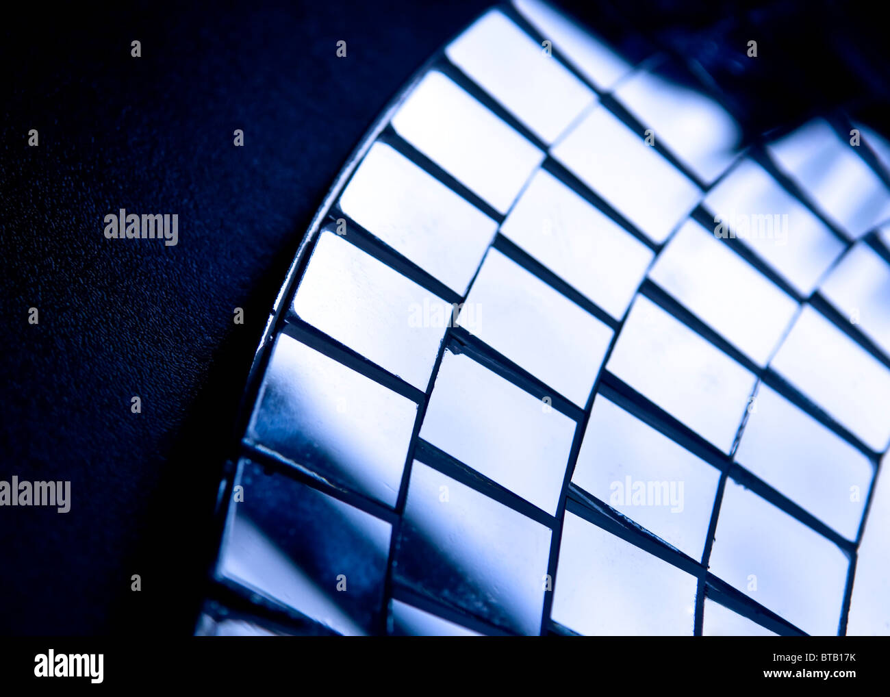 Light and shadow across glass squares in circular patterns Stock Photo ...