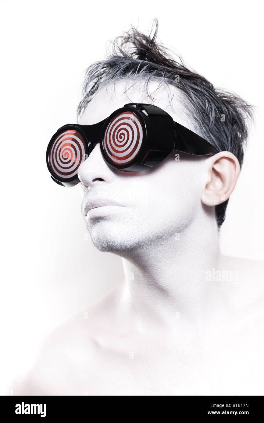 Portrait of a young man with white skin in strange glasses Stock Photo ...