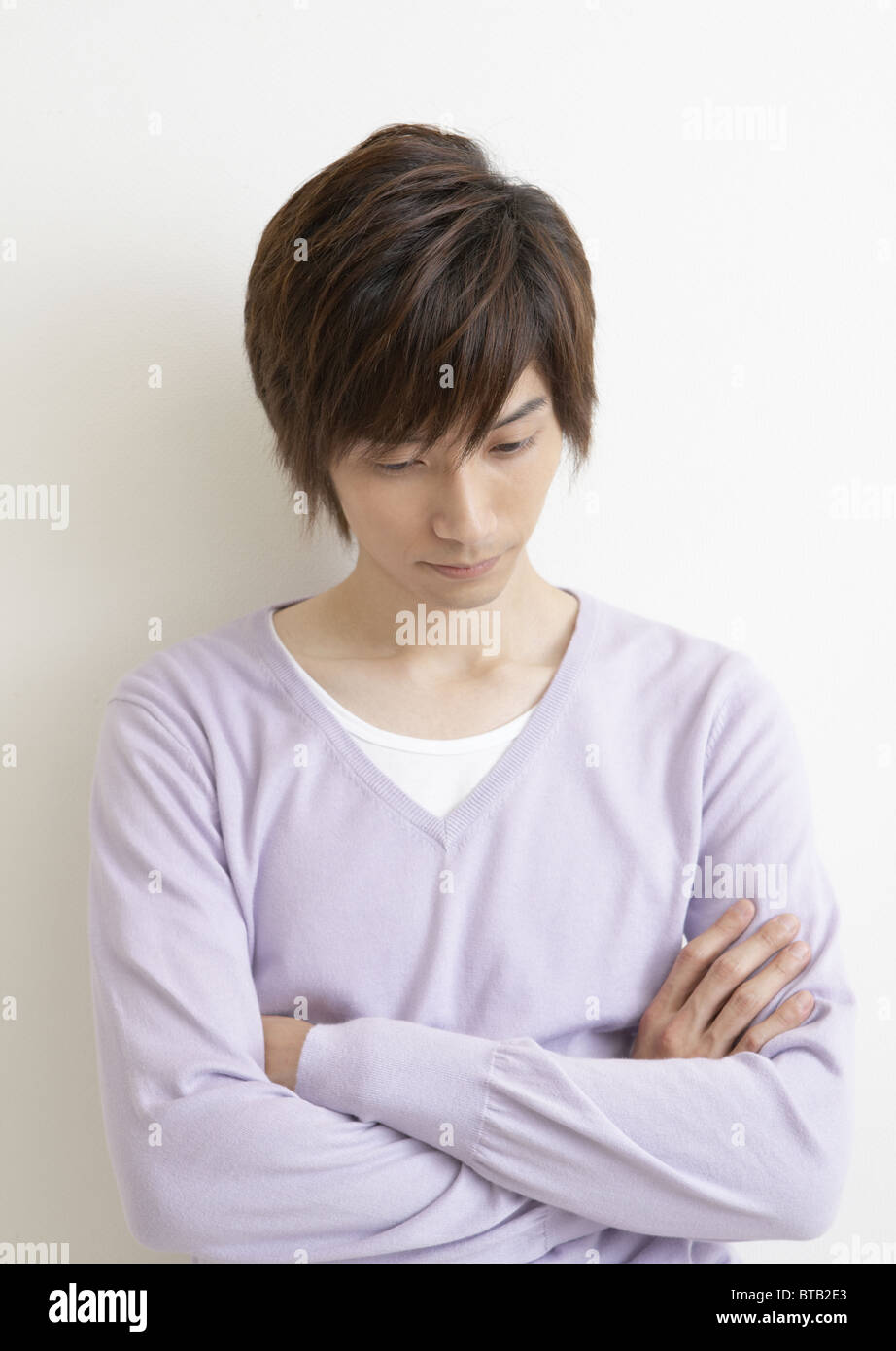 Man folding his arms hi-res stock photography and images - Alamy