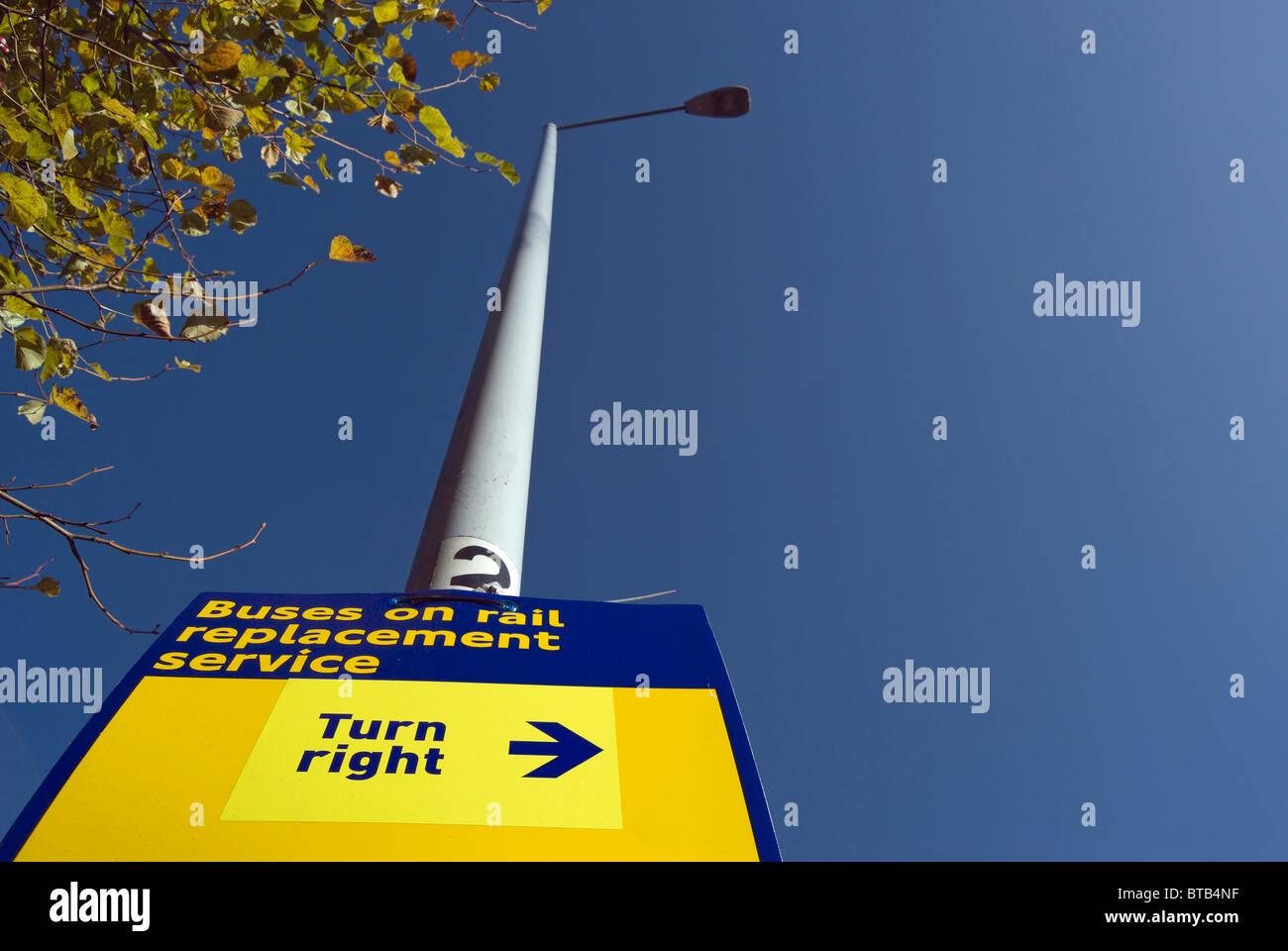 british turn right road sign for buses on rail replacement service ...