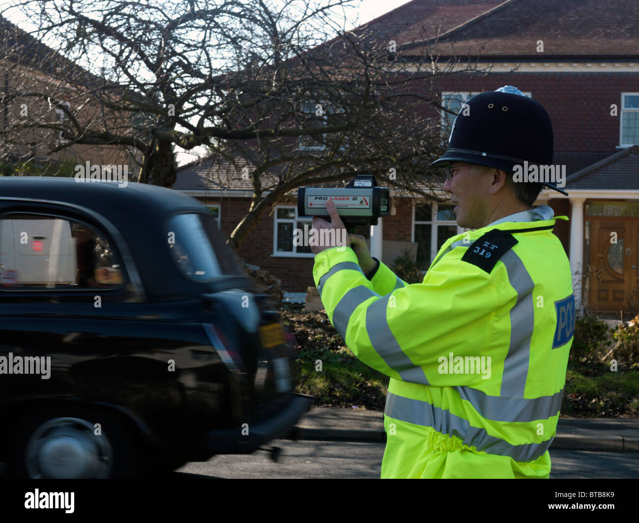 Policeman using speed radar gun hi-res stock photography and images - Alamy