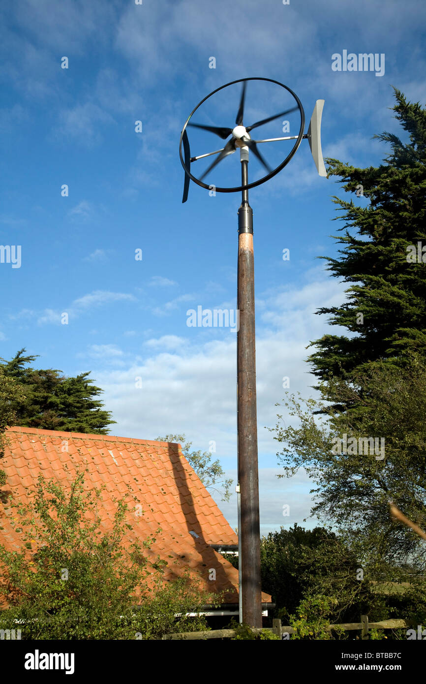 Domestic wind turbine generating electricity for home use Stock Photo ...