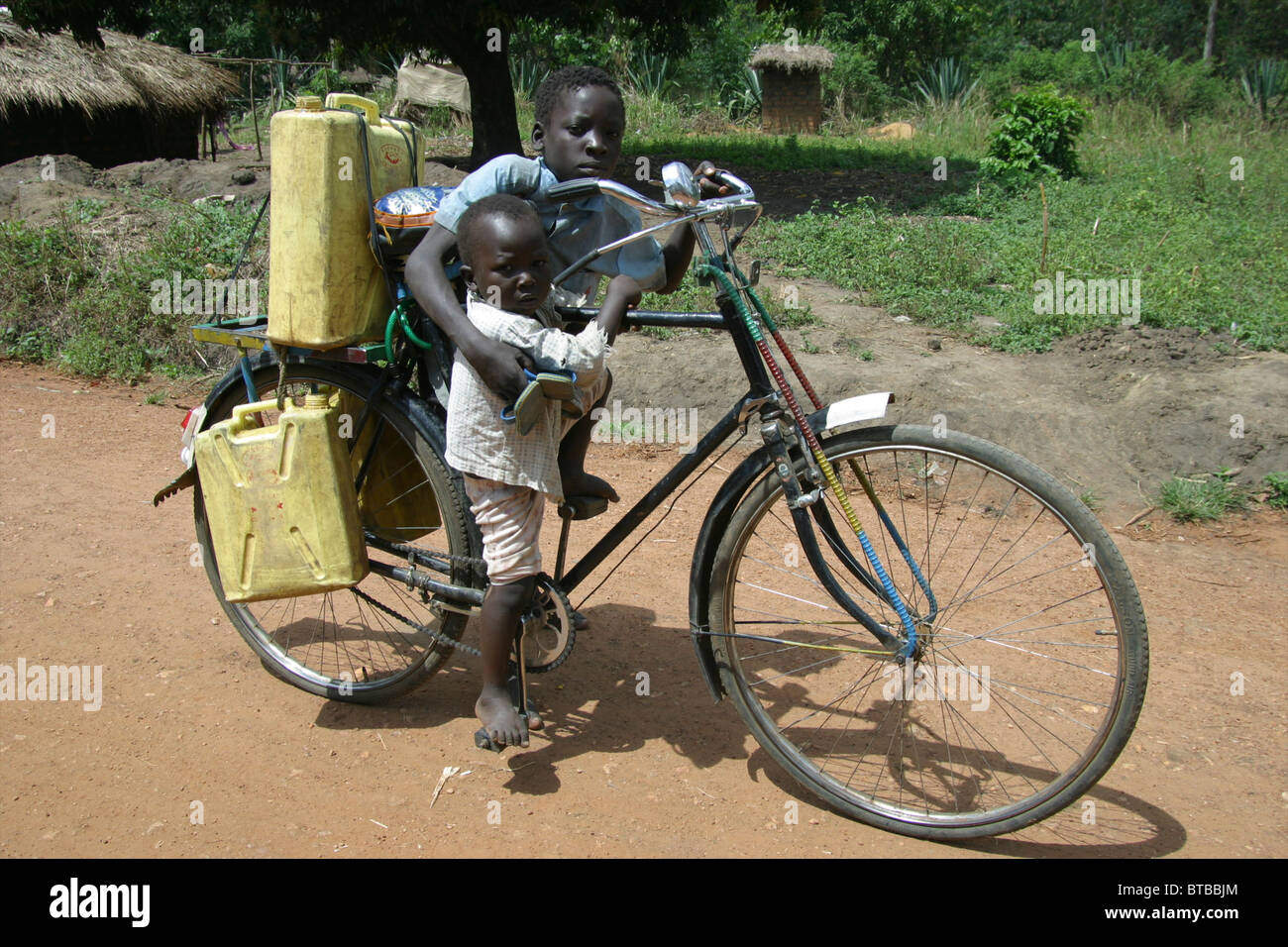 Child fetching drinking water hi-res stock photography and images - Alamy