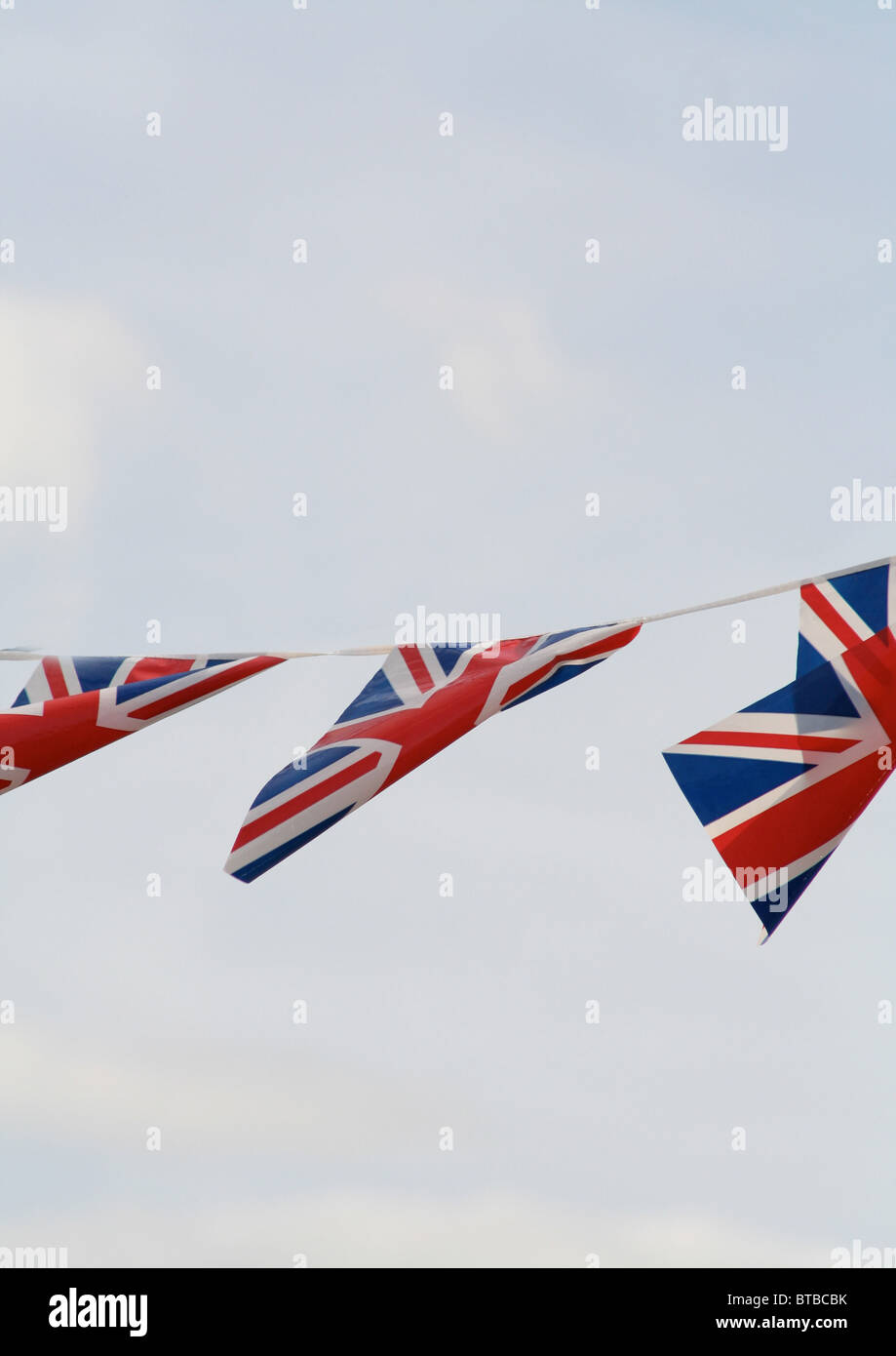 British Flag with a pastel background of the sky Stock Photo - Alamy