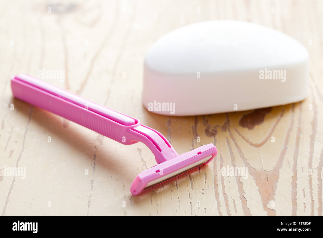 pink lady shaver on table Stock Photo - Alamy