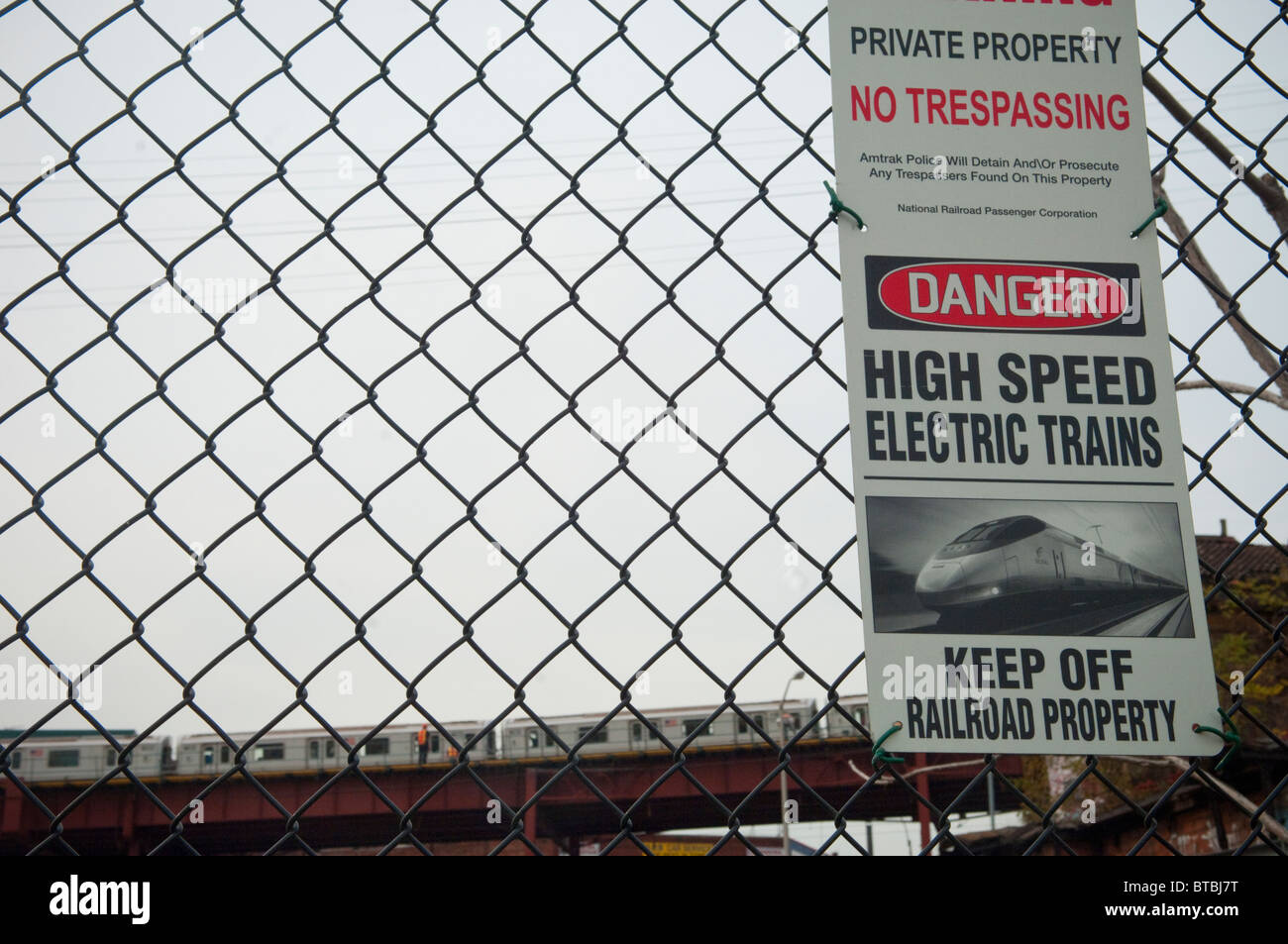 Amtrak railroad tracks warning sign Stock Photo - Alamy