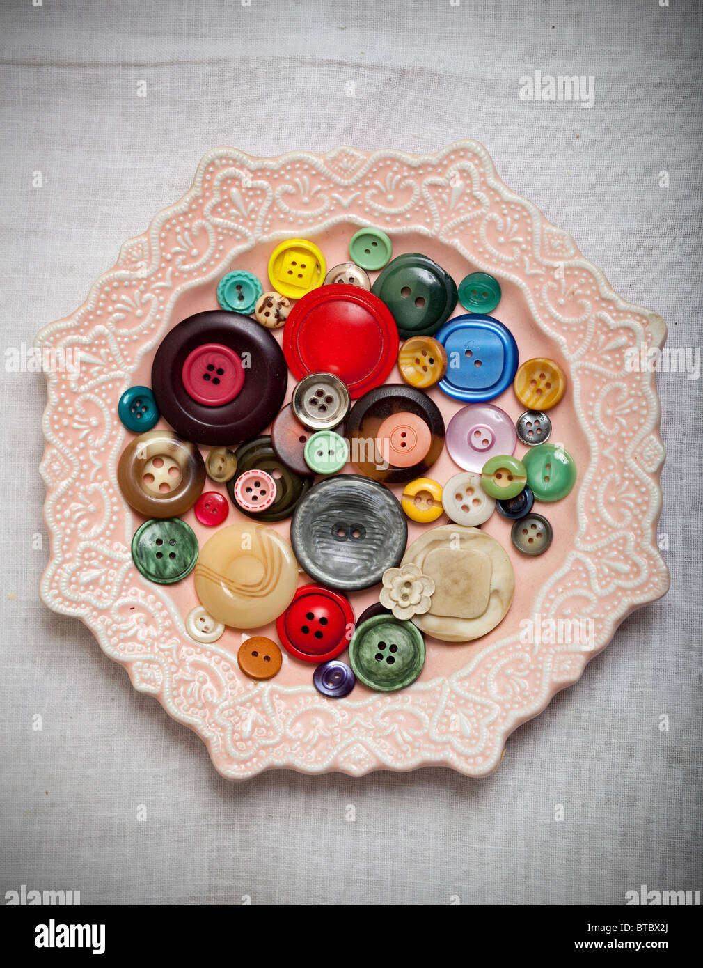 Plate of buttons Stock Photo - Alamy