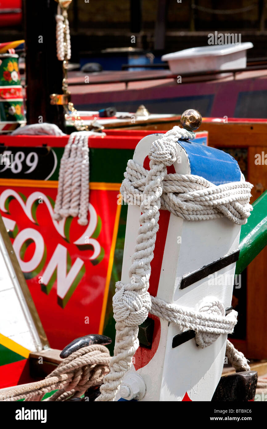 White plaited ropes and turks heads on a rudder of a historic narrow ...