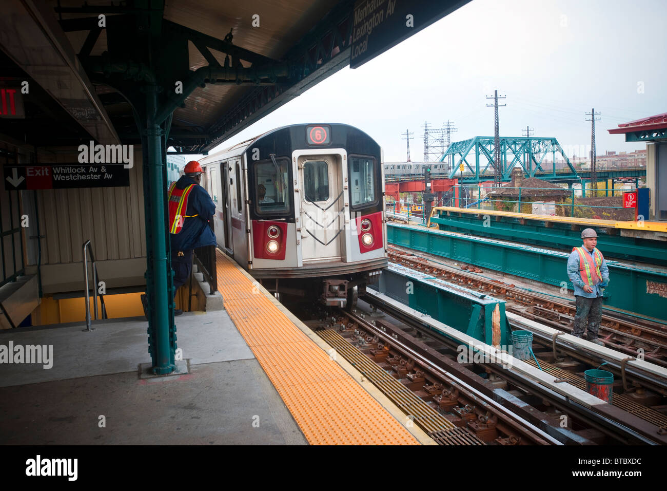 A Number 6 IRT train pulls into the Whitlock Avenue elevated station in ...