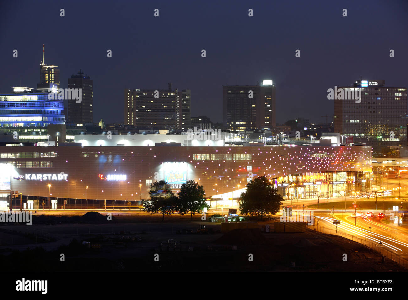 City skyline of Essen, Germany, at night. Shopping mall "Limbecker ...