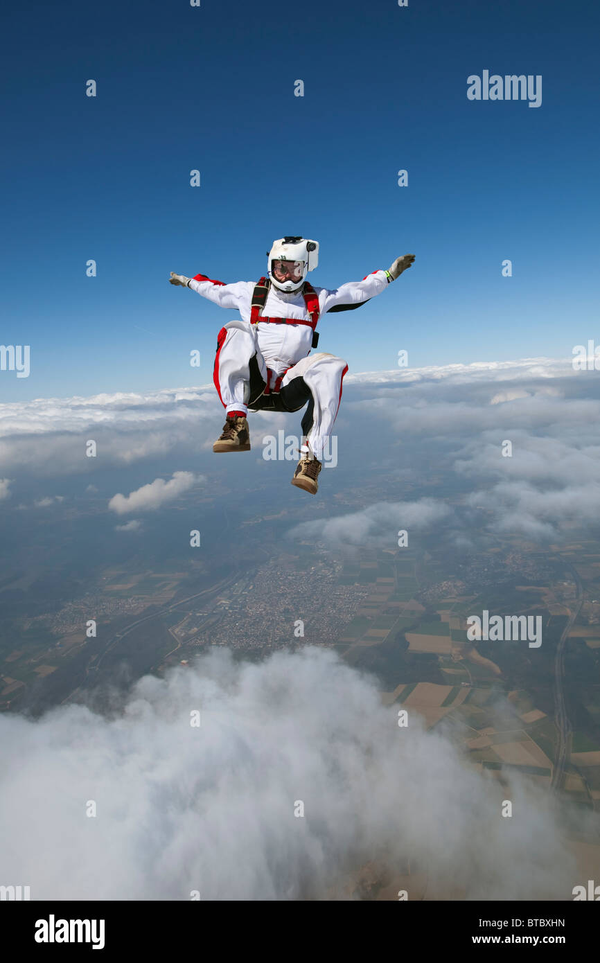 Man in freestyle sit position is falling in freefall with over 130 MPH ...
