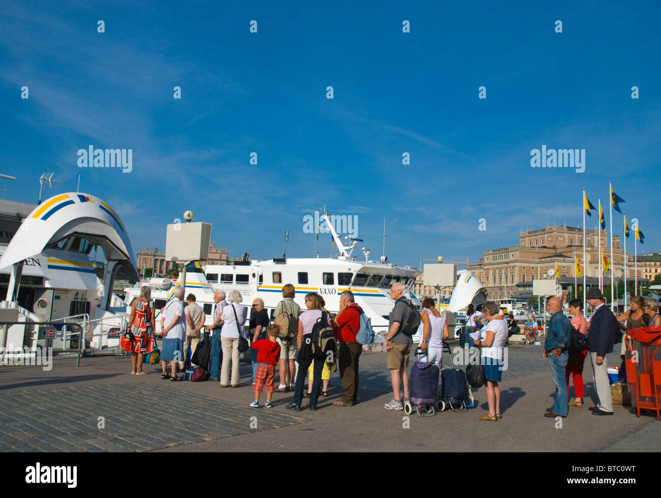 Queue to a ferry Strömkajen pier central Stockholm Sweden Europe Stock ...