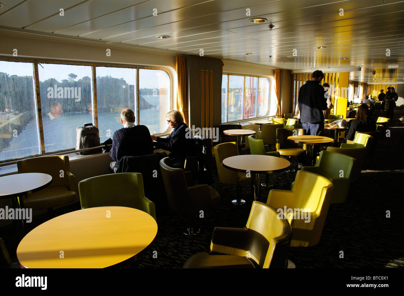 Passenger seating and bar area aboard a cross channel ferry Stock Photo ...