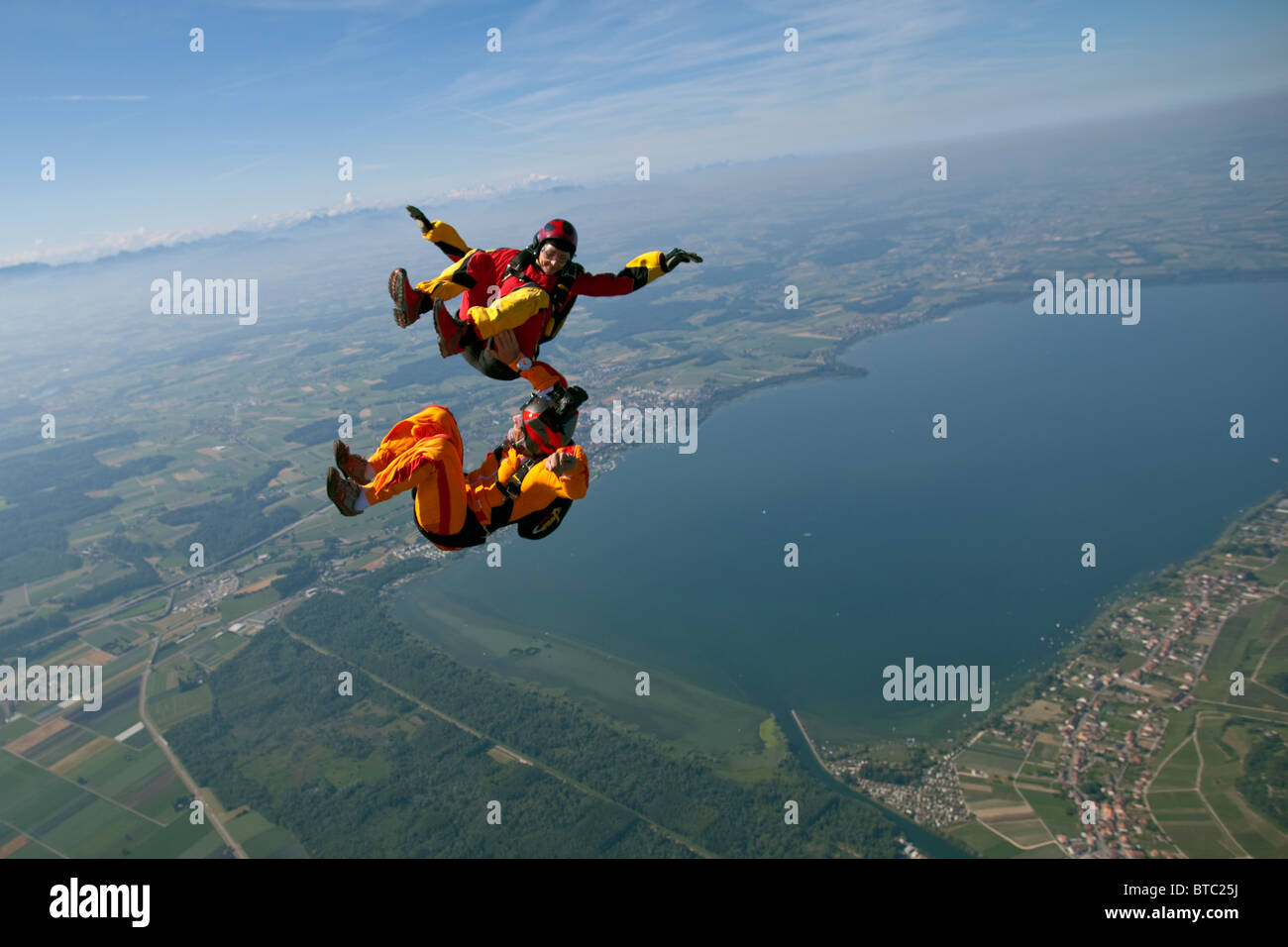 Freefly skydiving team is training formation back-flying over a ...