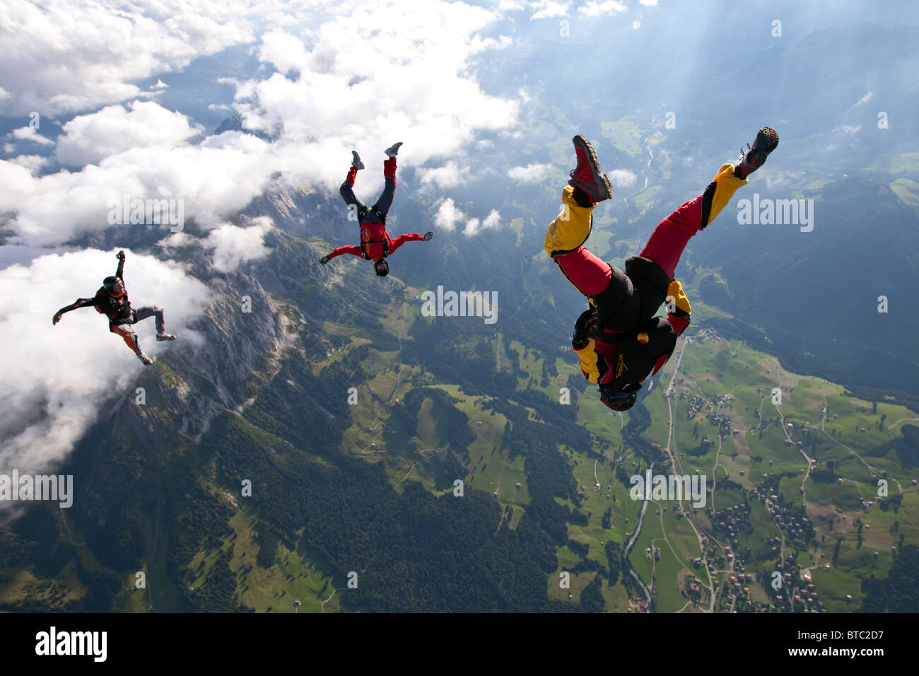 Freefly skydiving team is training the head down formation over a ...