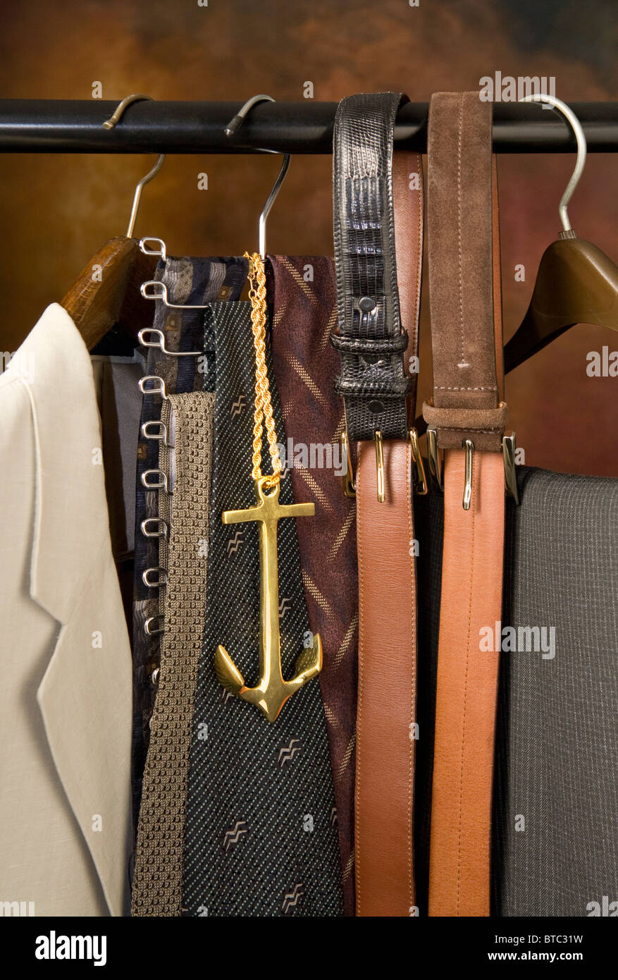 gold bling anchor with conservative wardrobe Stock Photo - Alamy