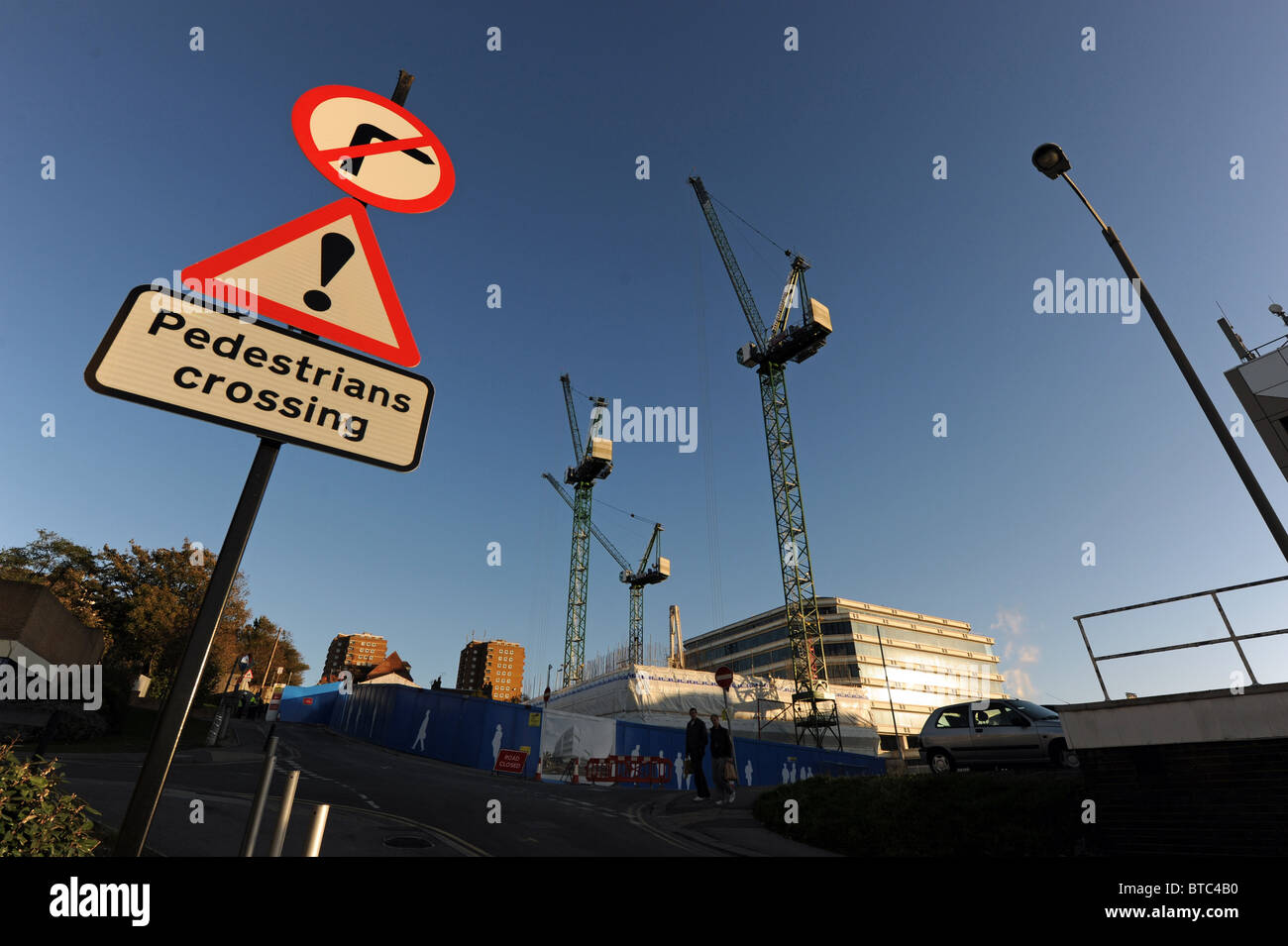 Pedestrians in road ahead sign hi-res stock photography and images - Alamy