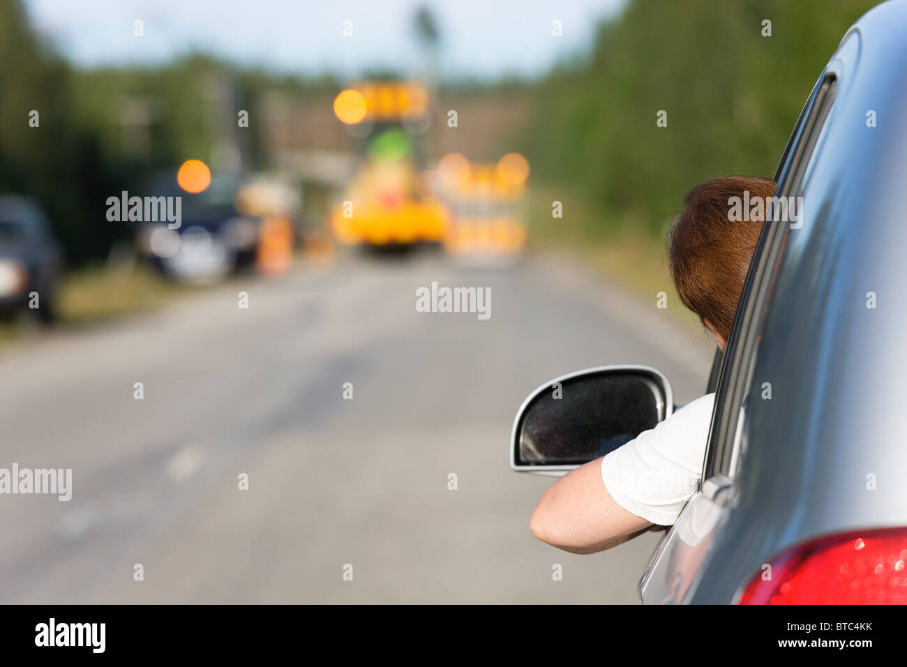 Car stopping at road work Stock Photo - Alamy