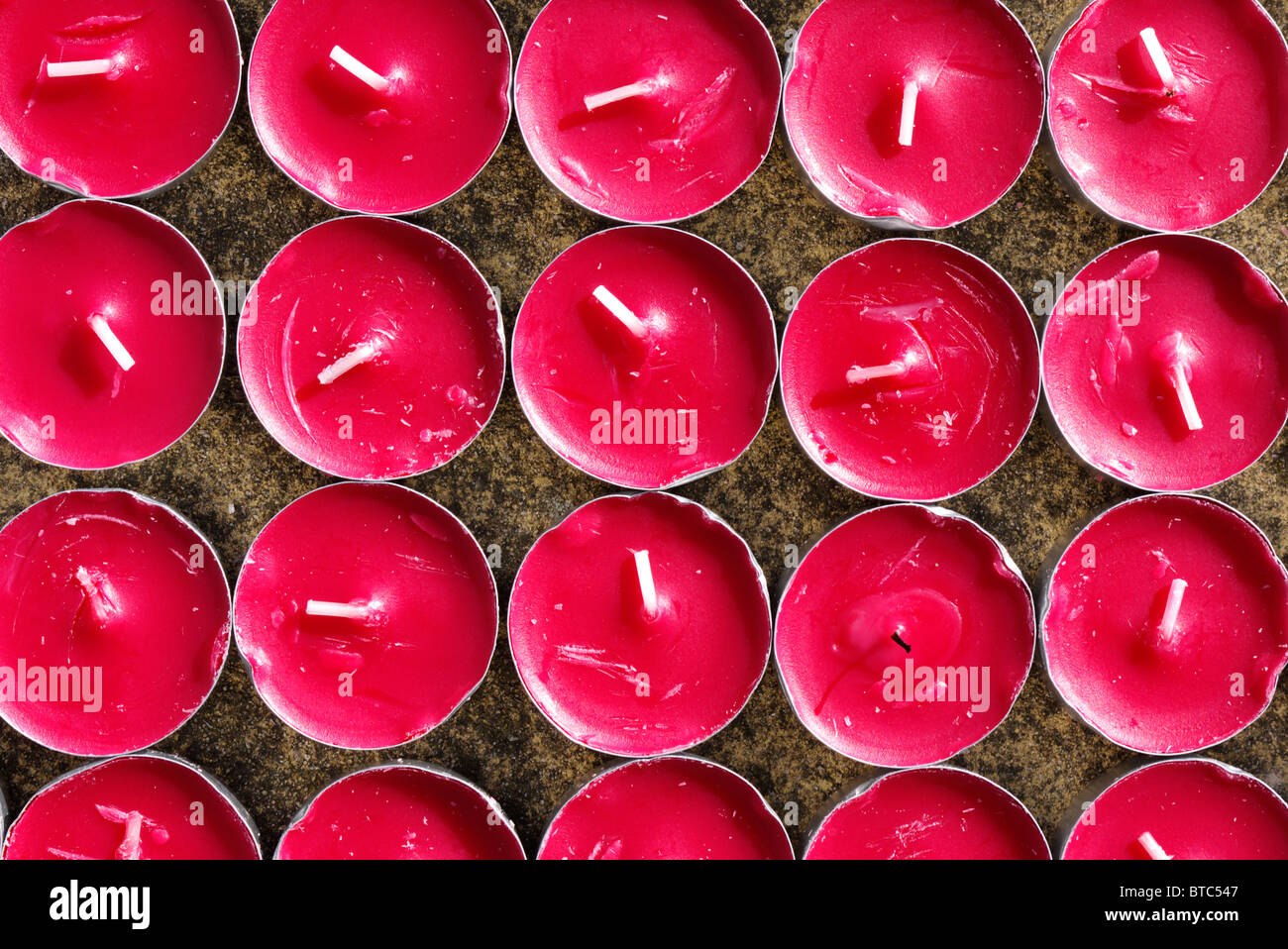 Tea candles in lines Stock Photo - Alamy
