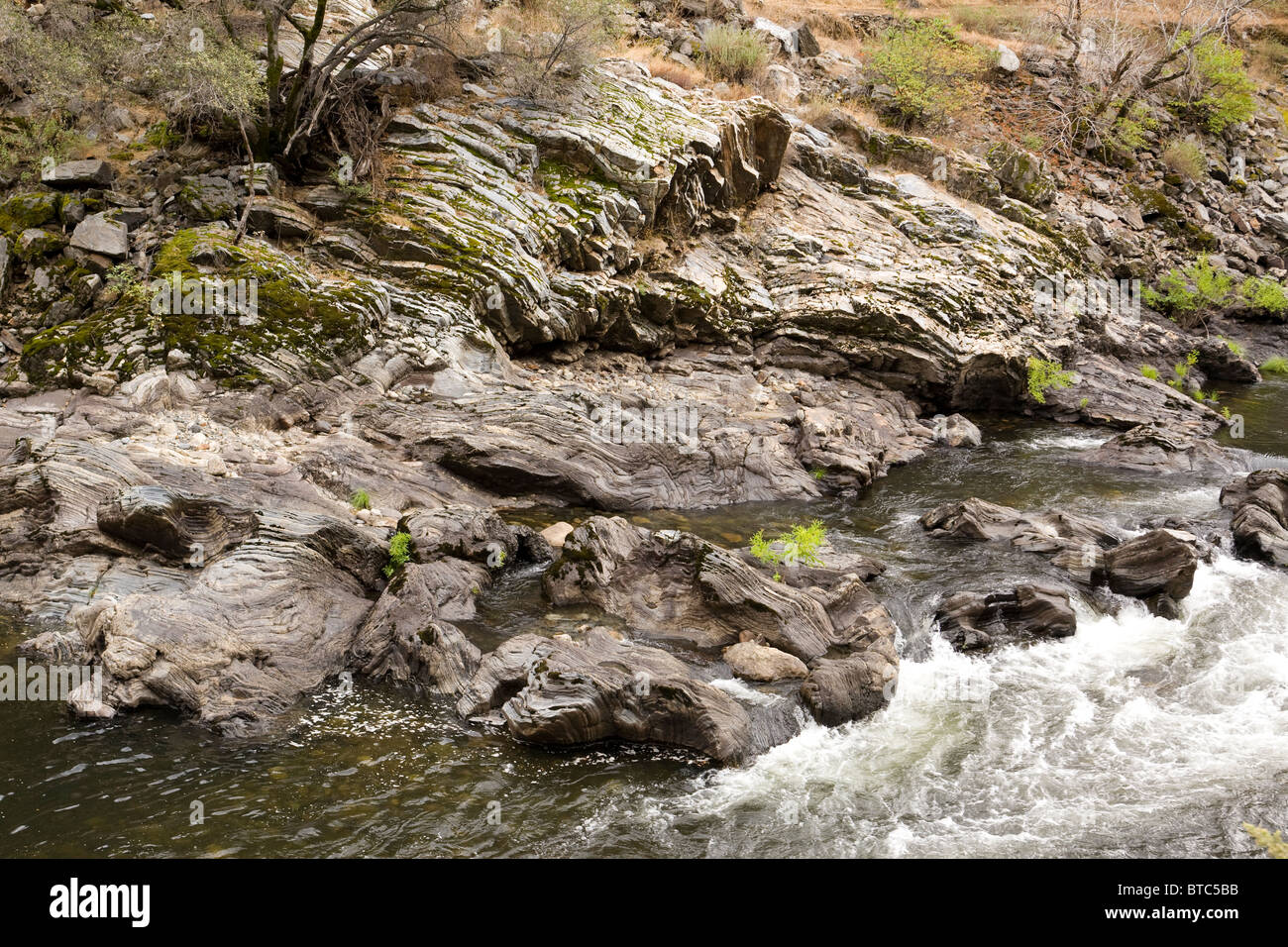 Folded rock formation exposed on riverbed - California USA Stock Photo ... Folded rock formation exposed on riverbed - California USA Stock Photo ...