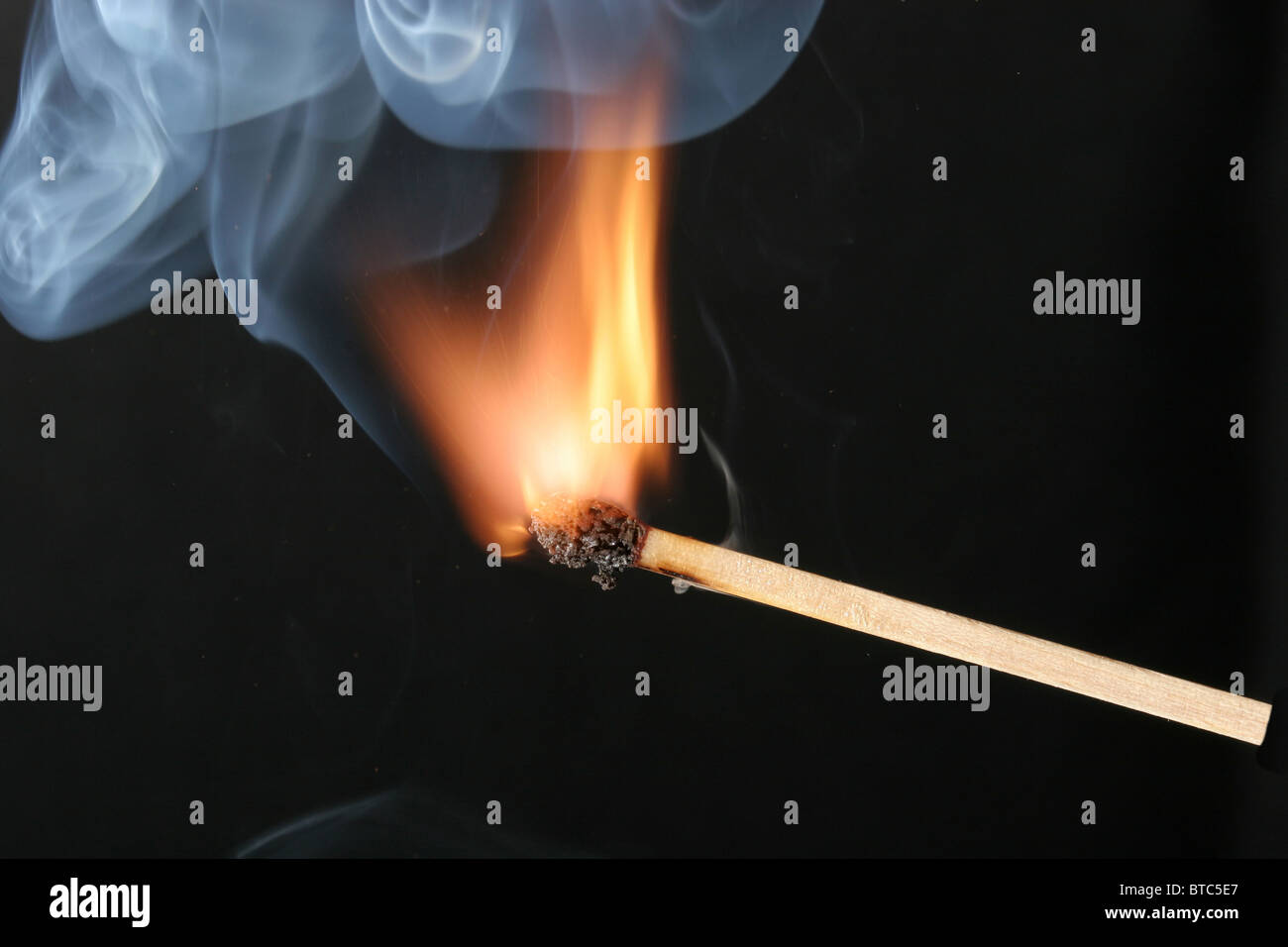 A burning match Stock Photo - Alamy