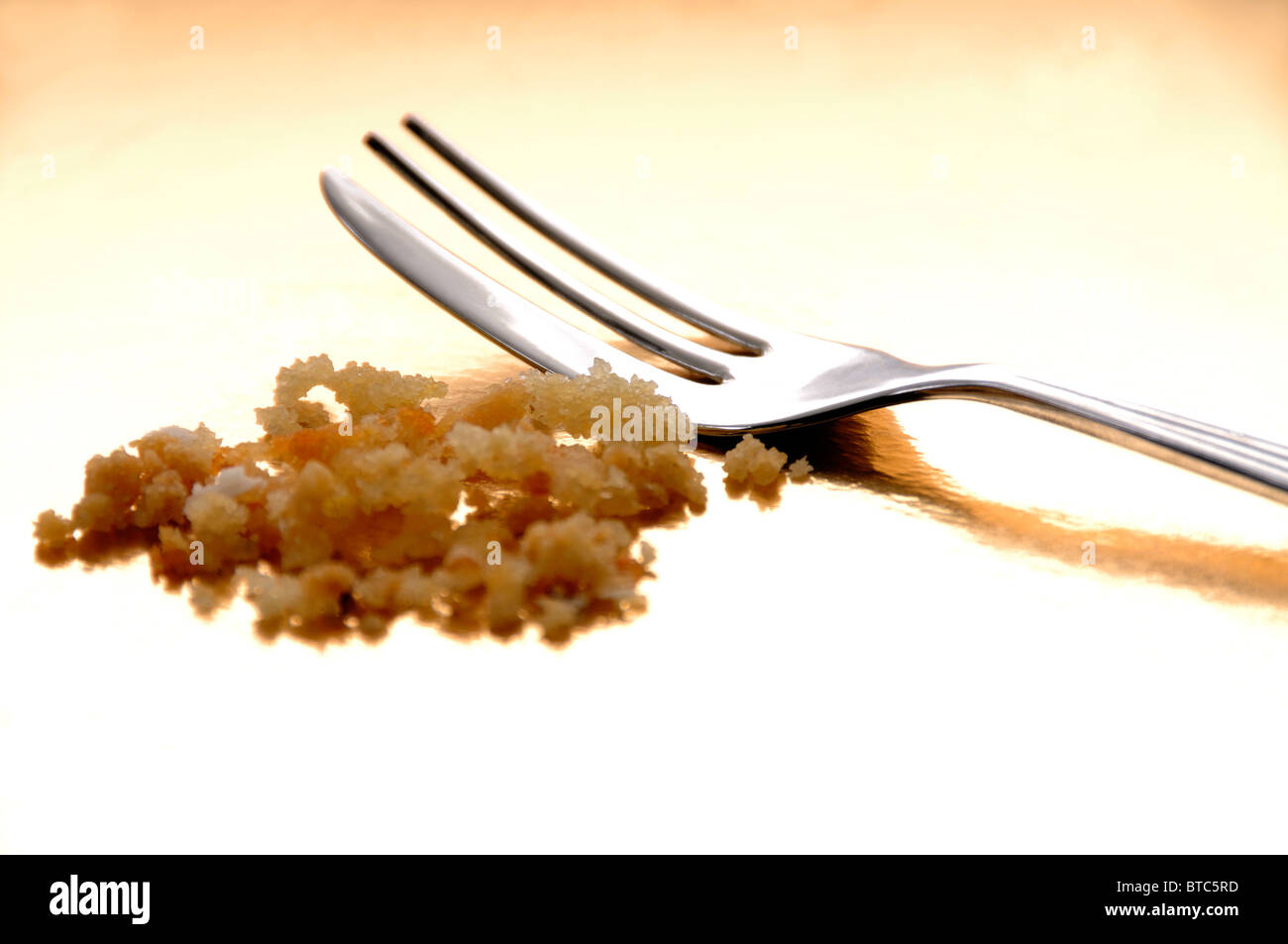 cake crumbs and fork Stock Photo - Alamy
