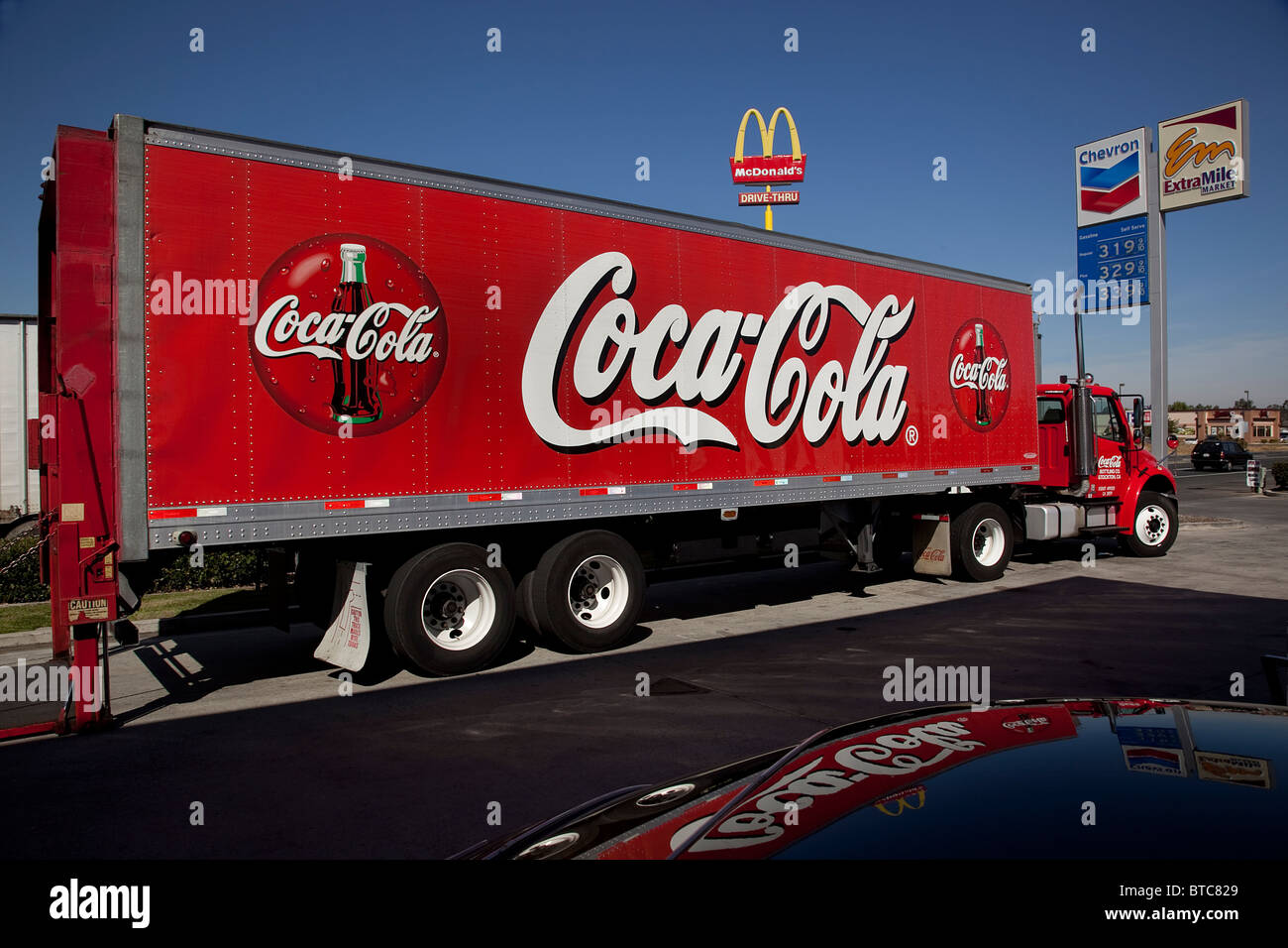 Semi Truck unloading at a gas station in California USA Stock Photo - Alamy