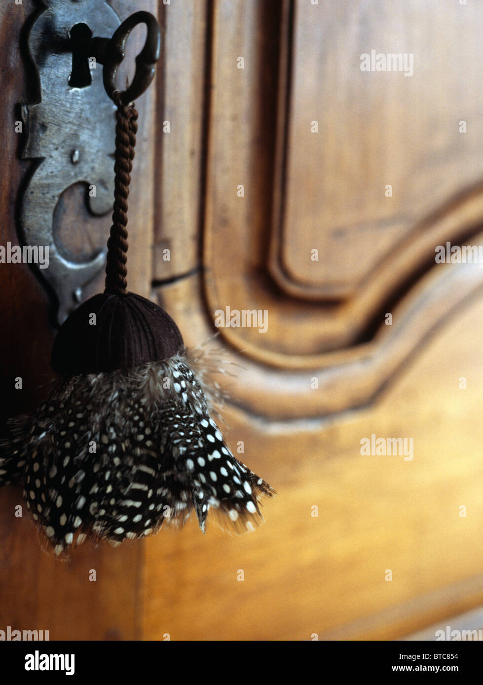Feather keys hi-res stock photography and images - Alamy