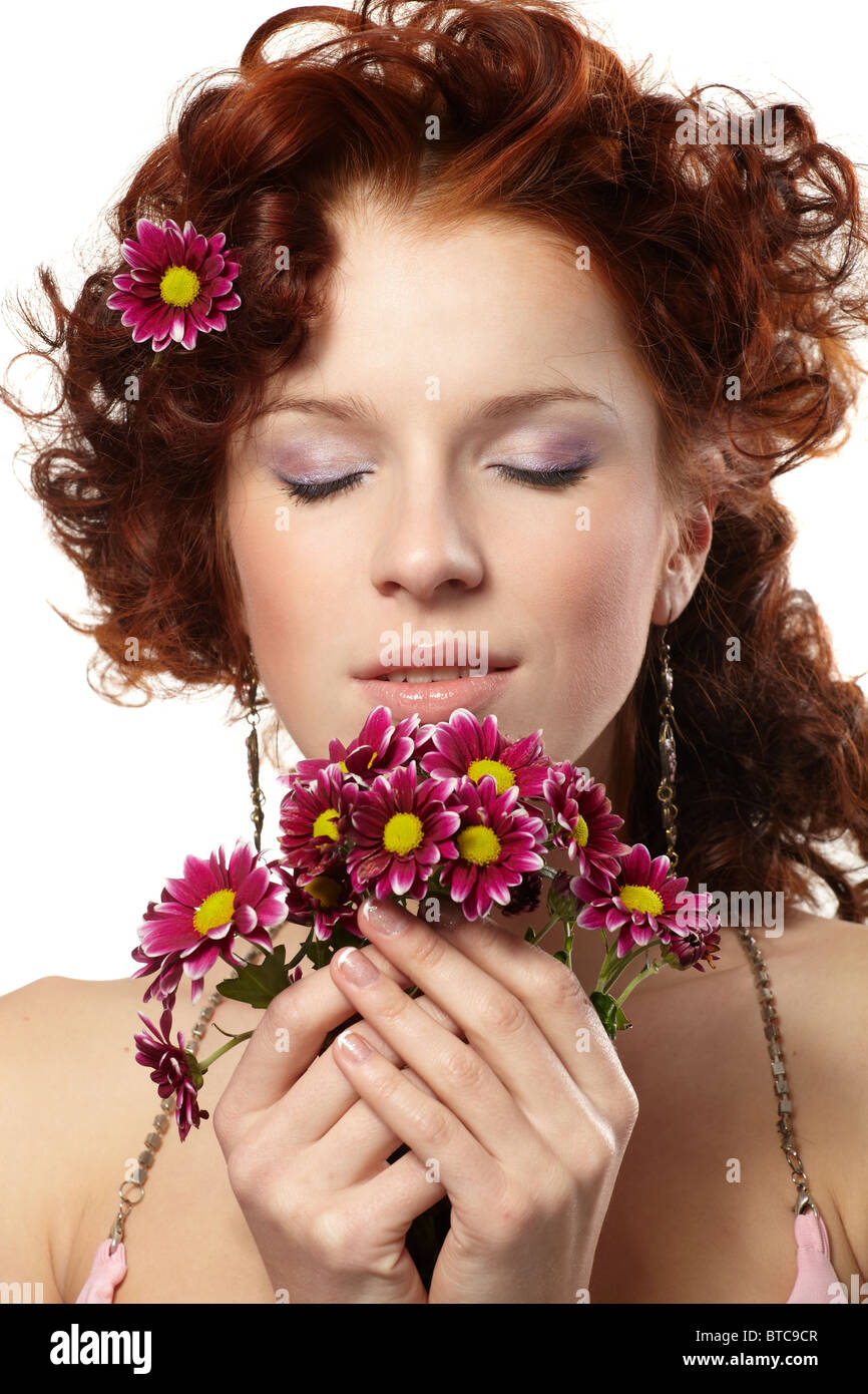Portrait of a happy women with flowers Stock Photo - Alamy