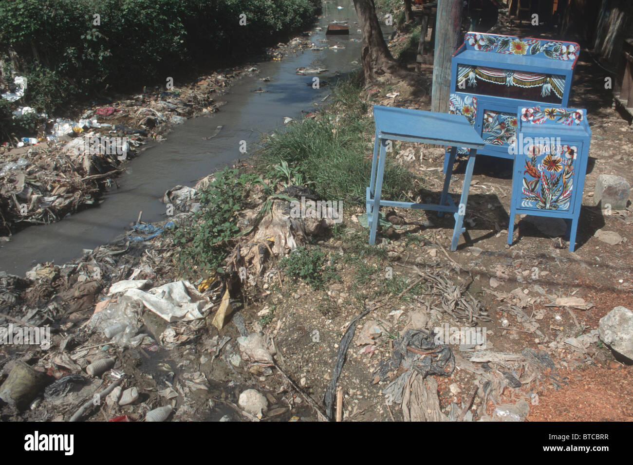 HAITI. OPEN SEWAGE IN THE SLUMS OF OF CITE SOLEIL, PORT AU PRINCE WHERE ...