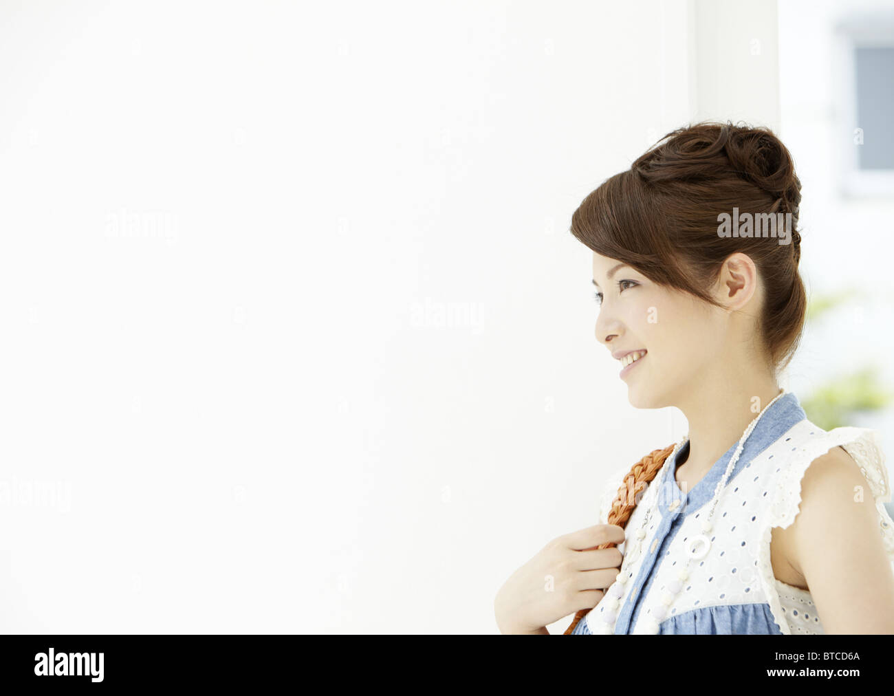 Woman going out Stock Photo - Alamy