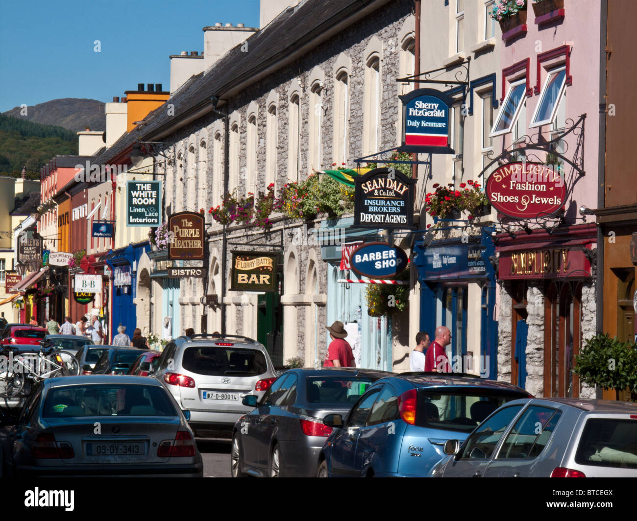 Signs in Henry Street, Kenmare Stock Photo - Alamy