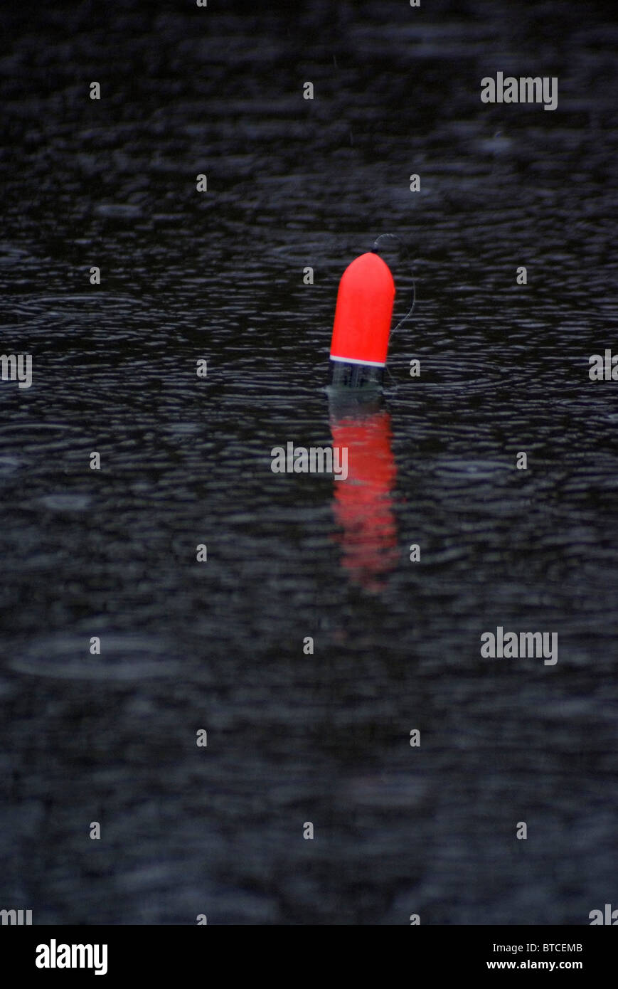 pike fishing float in river Stock Photo - Alamy