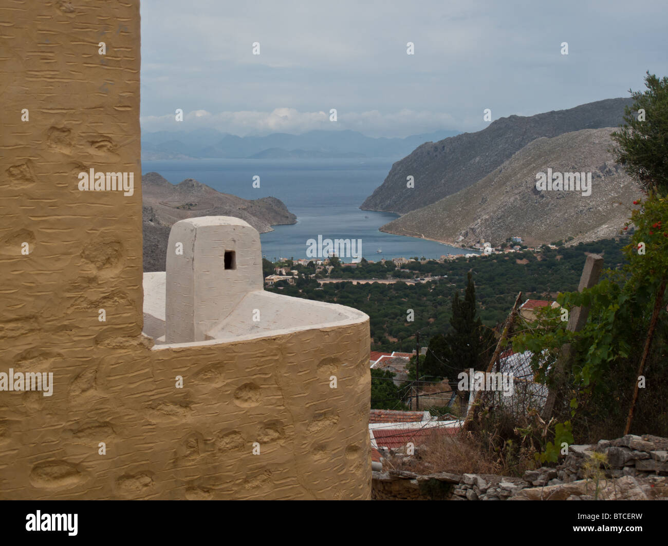 View down to Pedi beach from the old town in Symi Stock Photo - Alamy