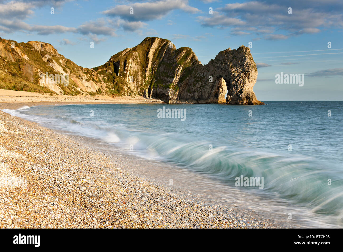 Durdle Door, Dorset, waves, afternoon, sunset, shingle, jurassic coast ...