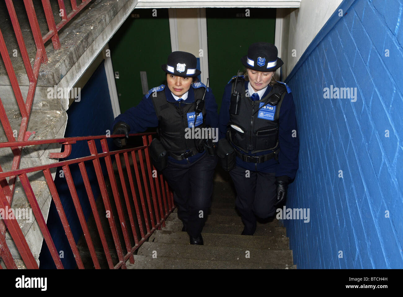 Two police women walking hi-res stock photography and images - Alamy