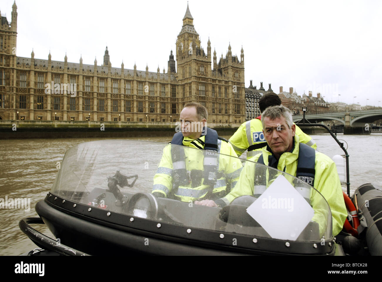 Metropolitan Police Marine Policing unit patrolling the river Thames ...