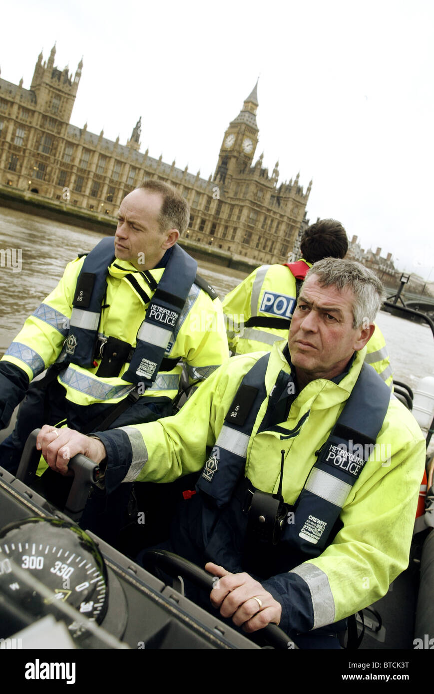 Metropolitan Police Marine Policing unit patrolling the river Thames ...