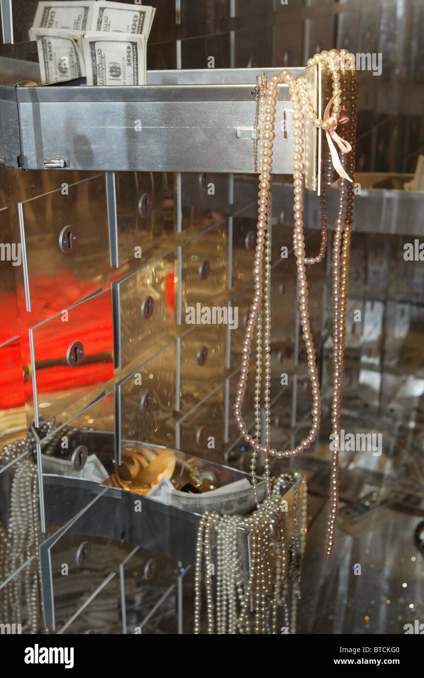 Money, valuables and jewelry from a failed robbery attempt hanging out ...