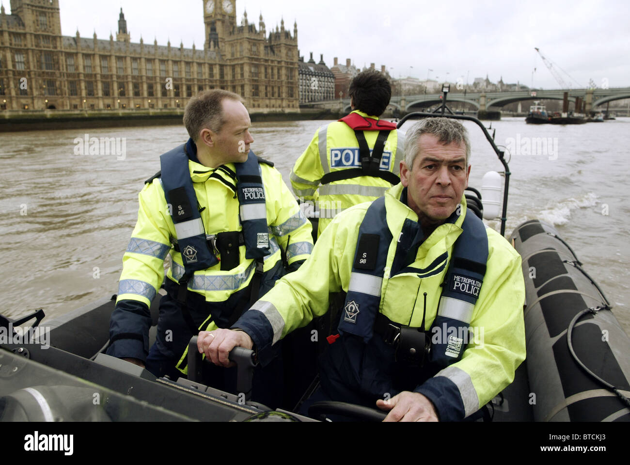 Metropolitan Police Marine Policing unit patrolling the river Thames ...