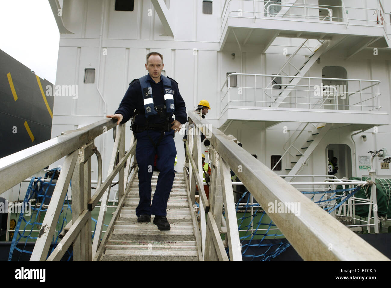 Officer from Metropolitan Police Marine Policing unit on the river ...