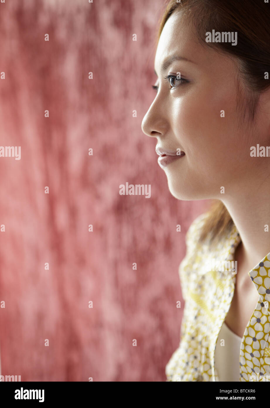 Upper body profile young woman hi-res stock photography and images - Alamy