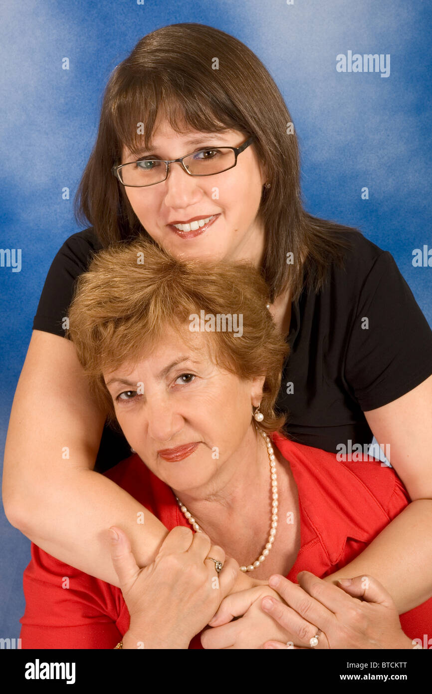 happy family portrait of young woman hugging her mother Stock Photo - Alamy