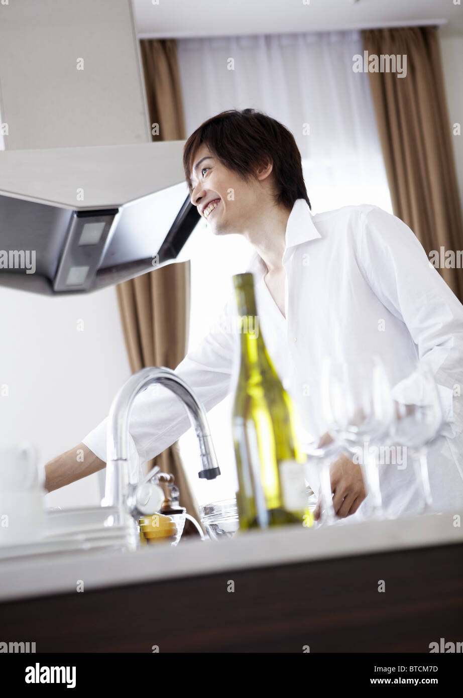 Man in kitchen Stock Photo - Alamy