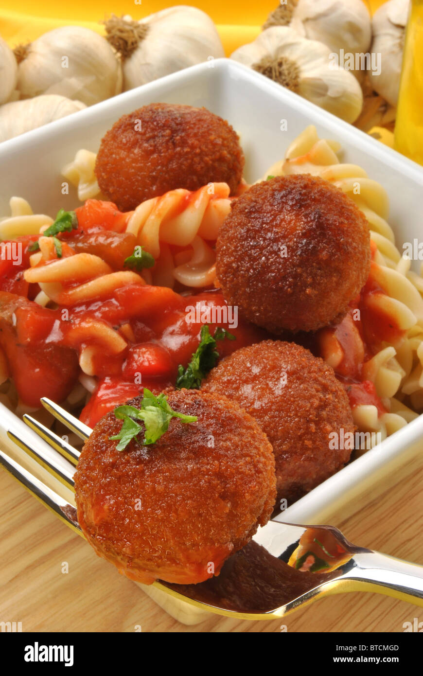 chicken meat balls with pasta in a bowl Stock Photo - Alamy