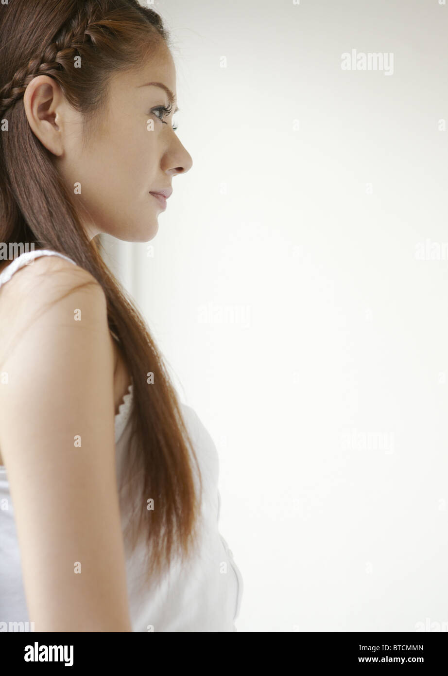 Upper body profile young woman hi-res stock photography and images - Alamy