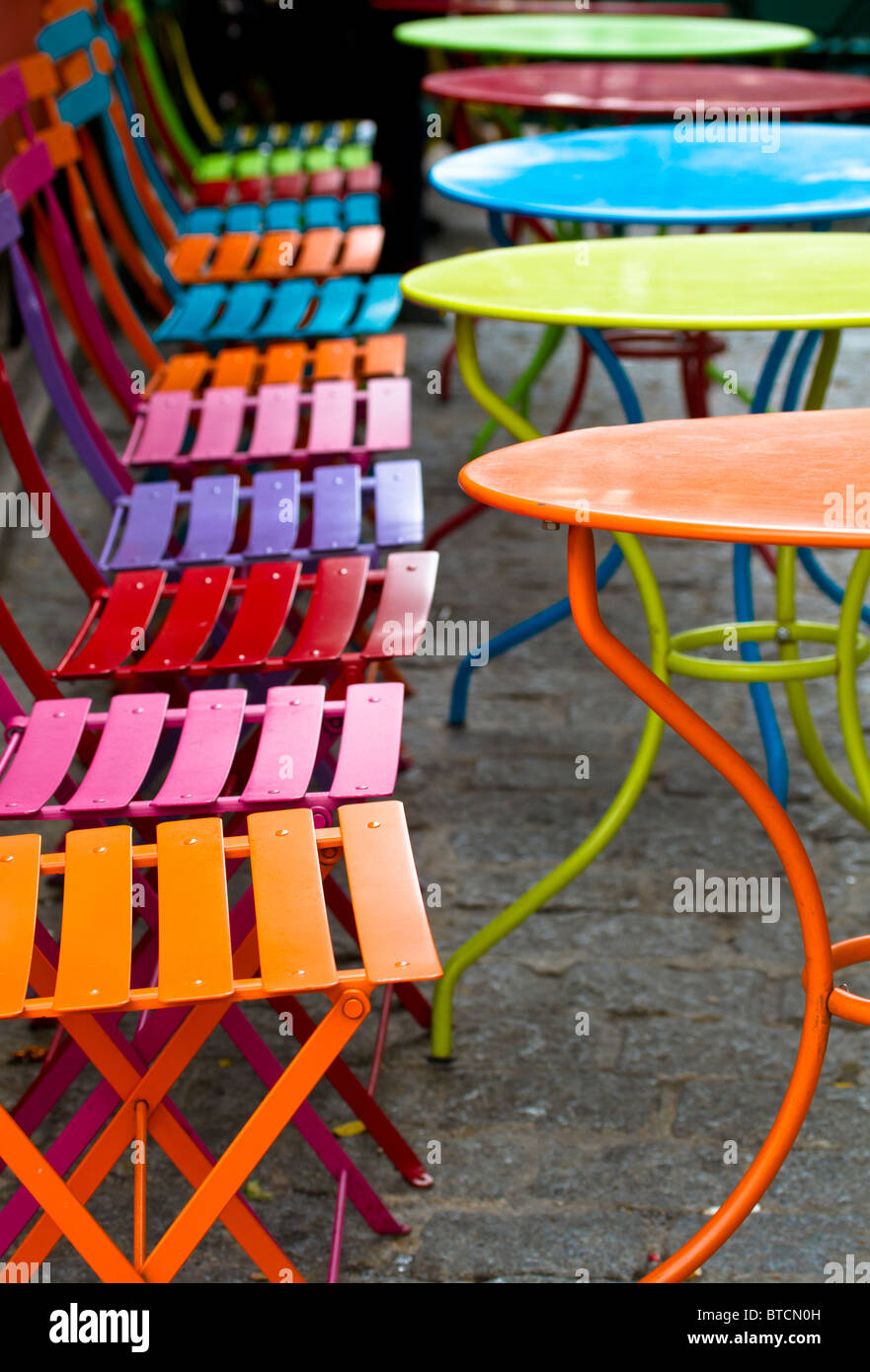 Colorful chairs and tables Stock Photo - Alamy
