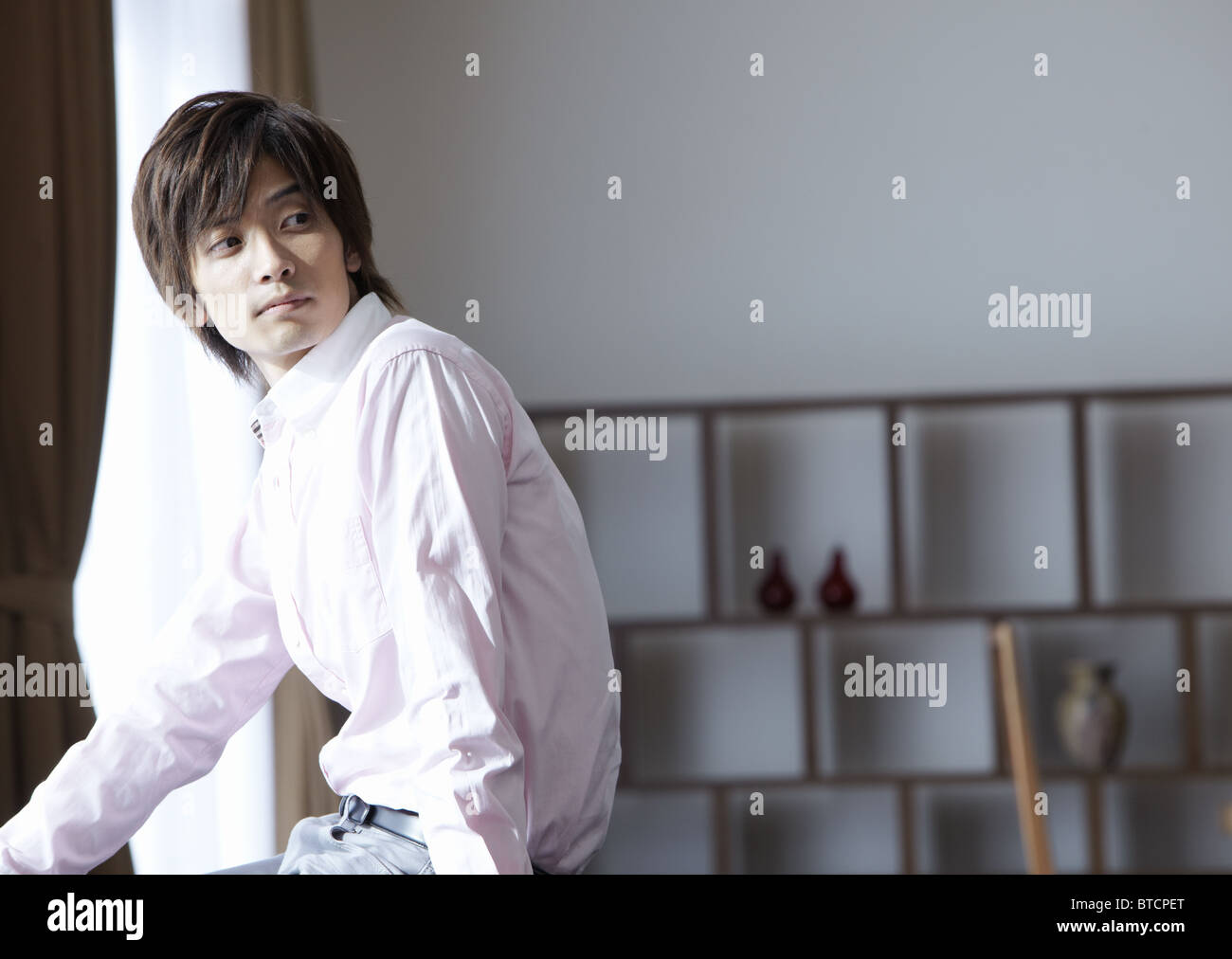 Man turning around Stock Photo - Alamy