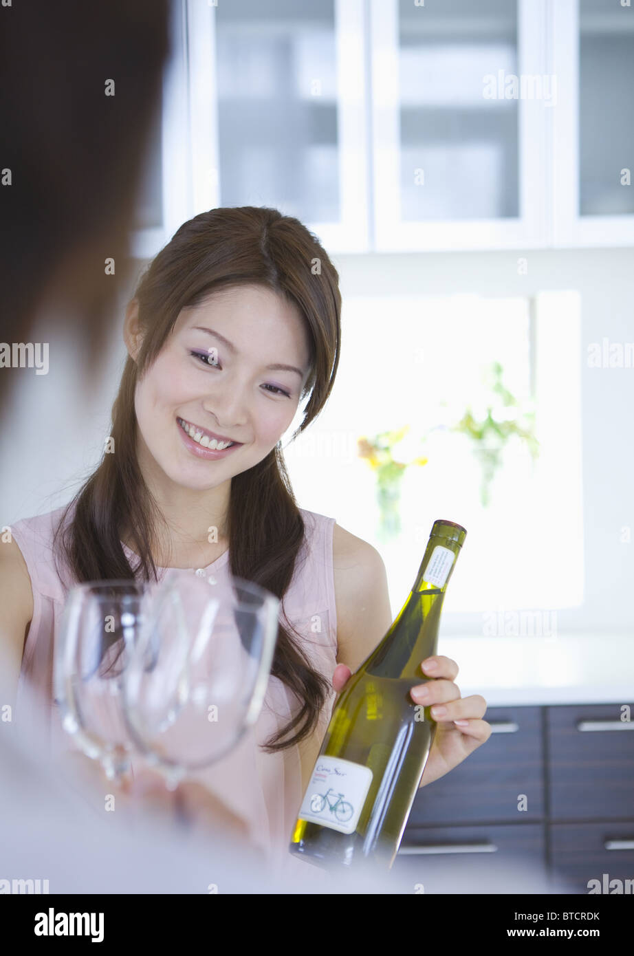 Couple preparing wine Stock Photo - Alamy