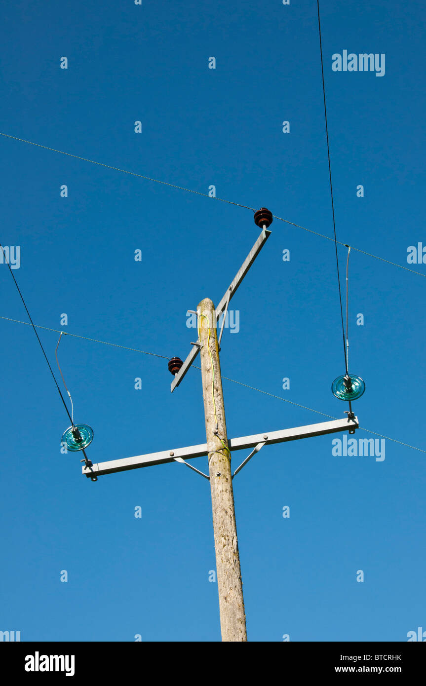 An electrical power line cuts across the sky Stock Photo - Alamy
